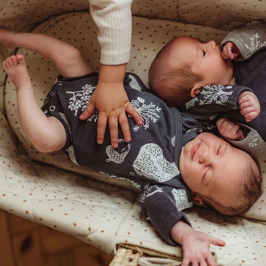 Newborn Cocooi Sleeping Bags, Bodysuits & Hat Sets | Merino Kids UK